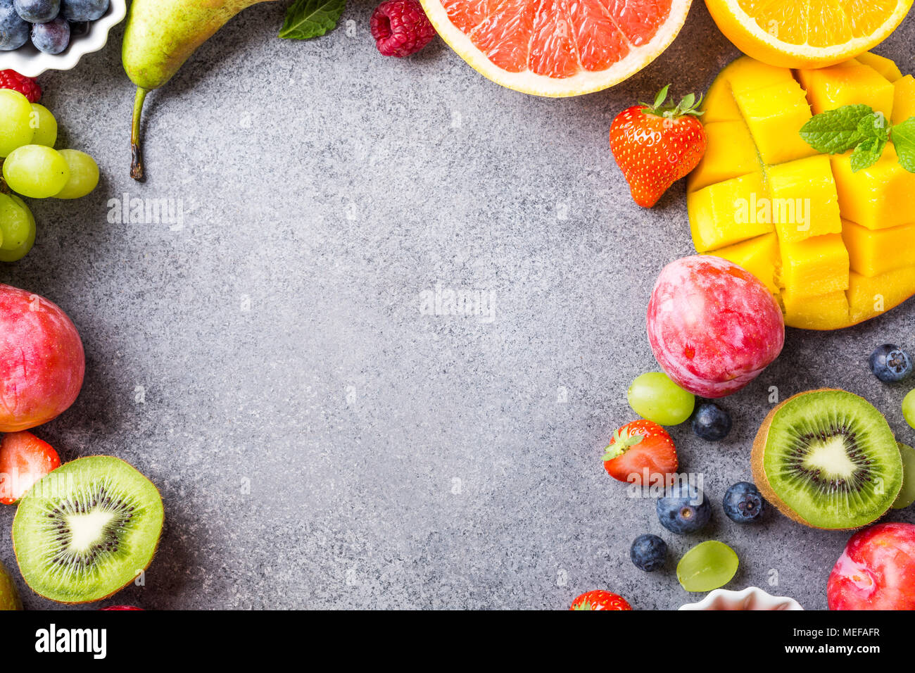 Fresh assorted fruits and berries Stock Photo - Alamy