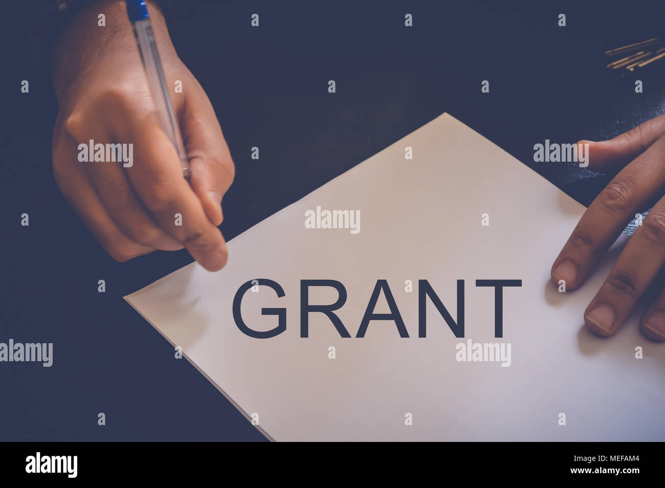 Grant word written on white paper Stock Photo - Alamy