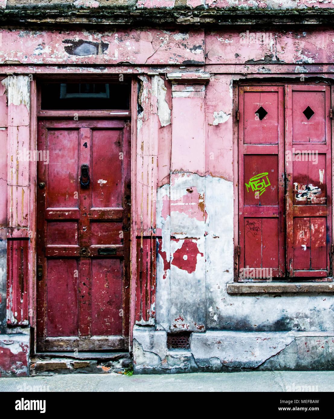 Red Windows and Shutters on a run-down London Street Stock Photo - Alamy