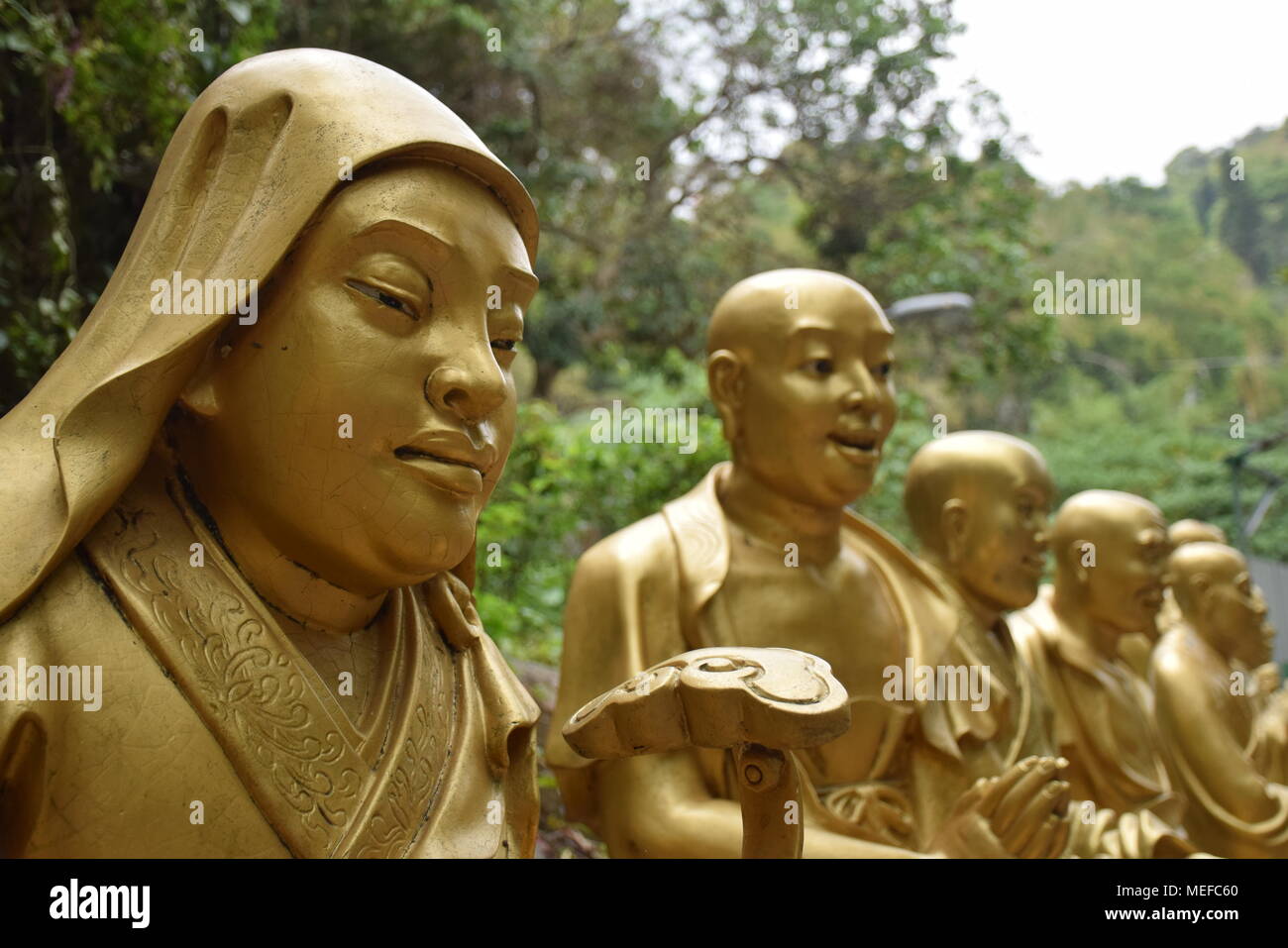 Golden statues inside the Ten thousand Buddhas Monastery in Sha Tin ...