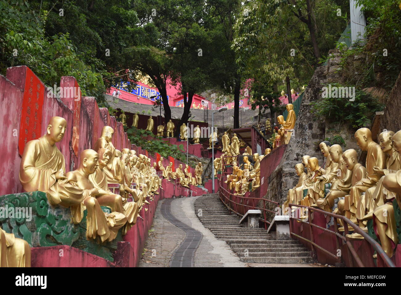 Golden statues inside the Ten thousand Buddhas Monastery in Sha Tin ...
