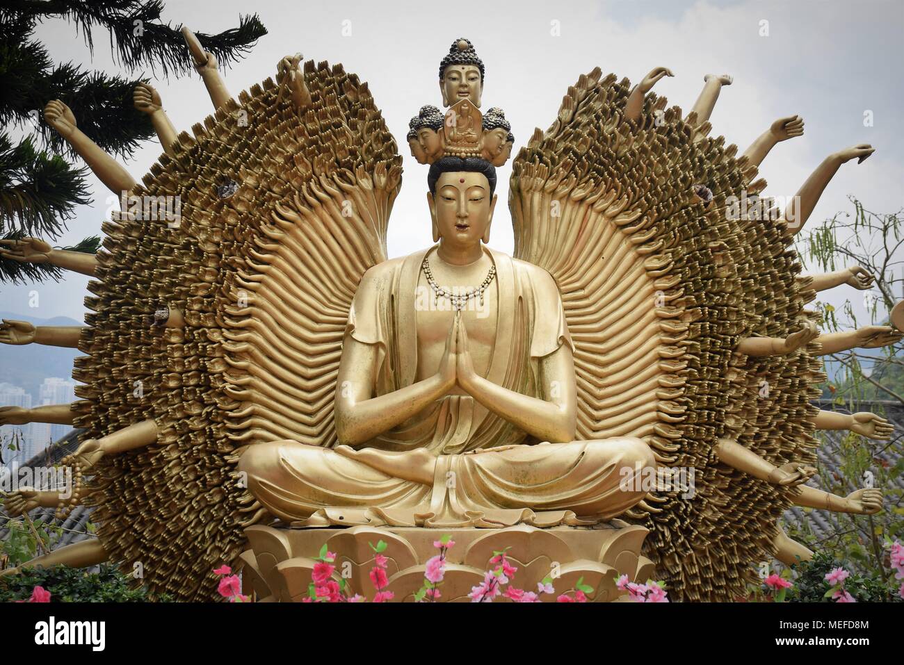 Golden statue of buddhist goddess inside the Ten thousand Buddhas ...