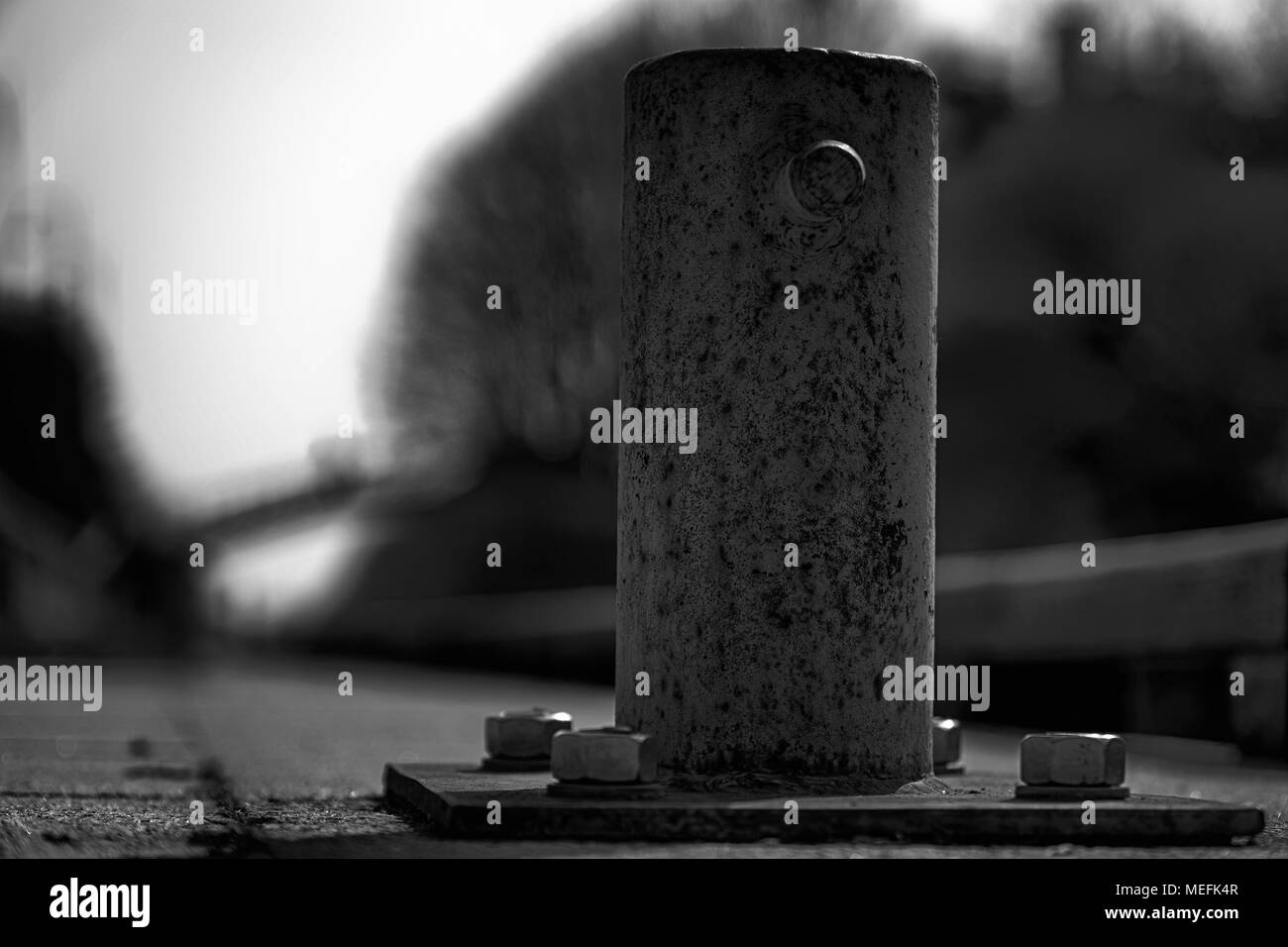 Mooring bollard for river boat, steel post for moorings Stock Photo - Alamy