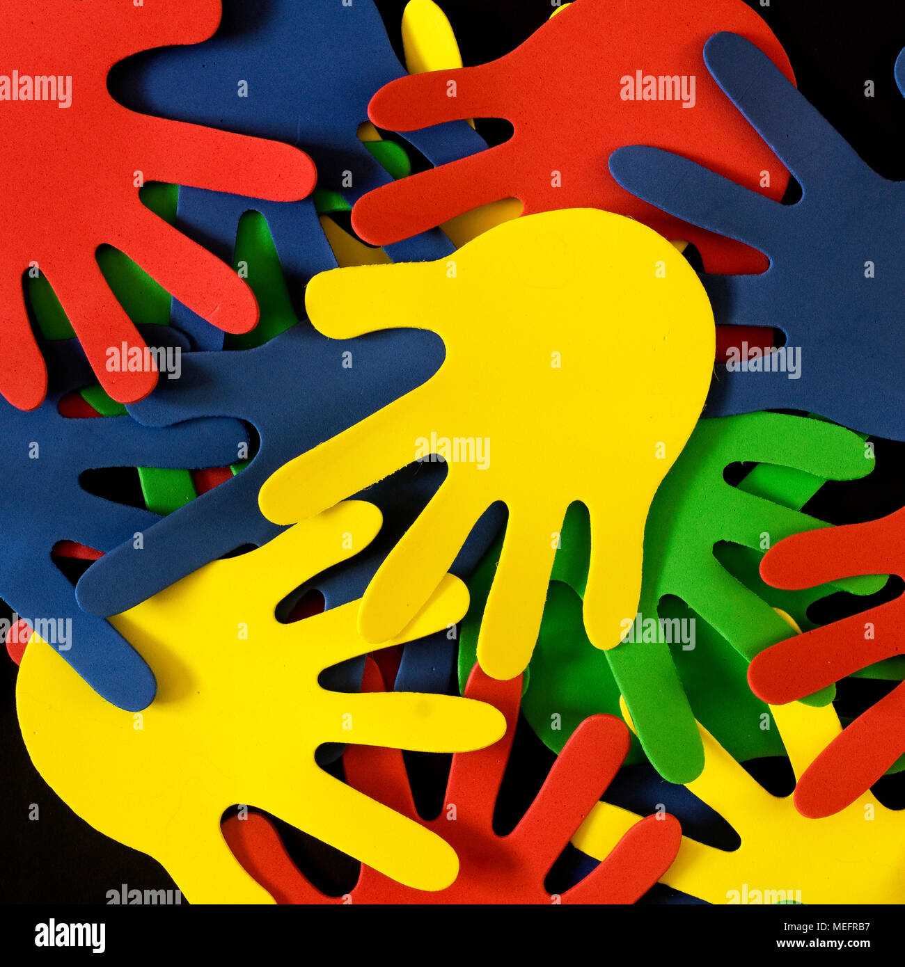 Four hands hi-res stock photography and images - Alamy