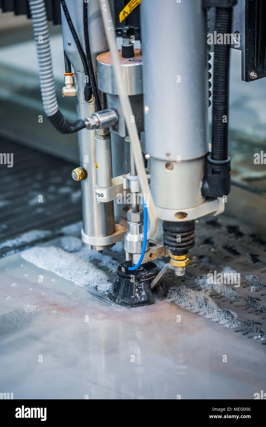 CNC water jet cutting machine modern industrial technology Stock Photo ...