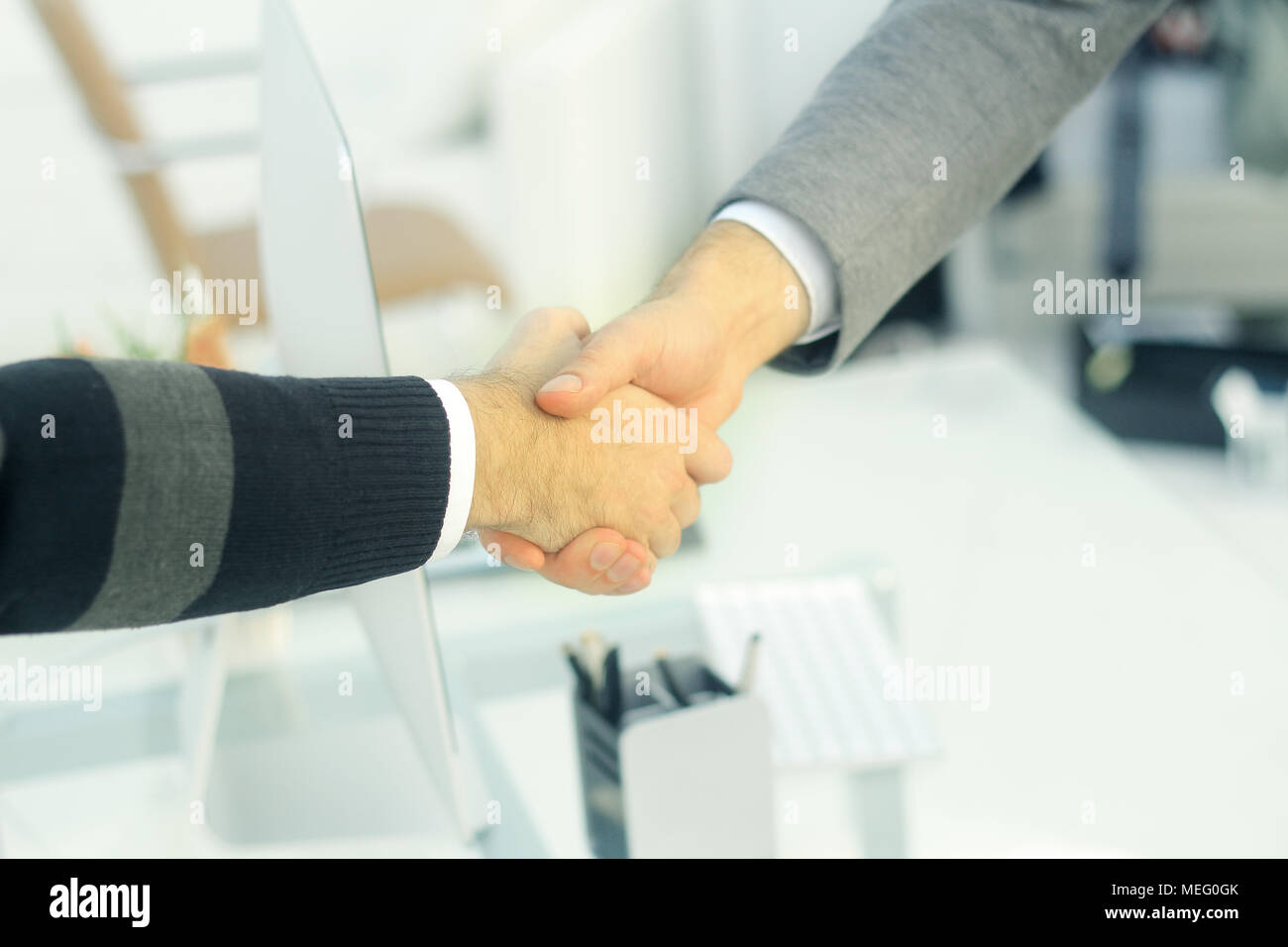 Man hand shaking office hi-res stock photography and images - Alamy