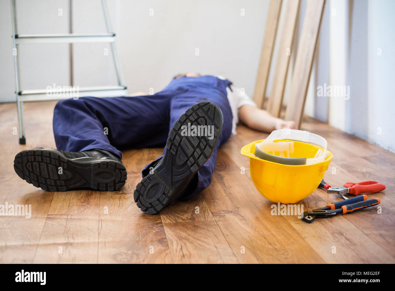 Man falling ladder hi-res stock photography and images - Alamy