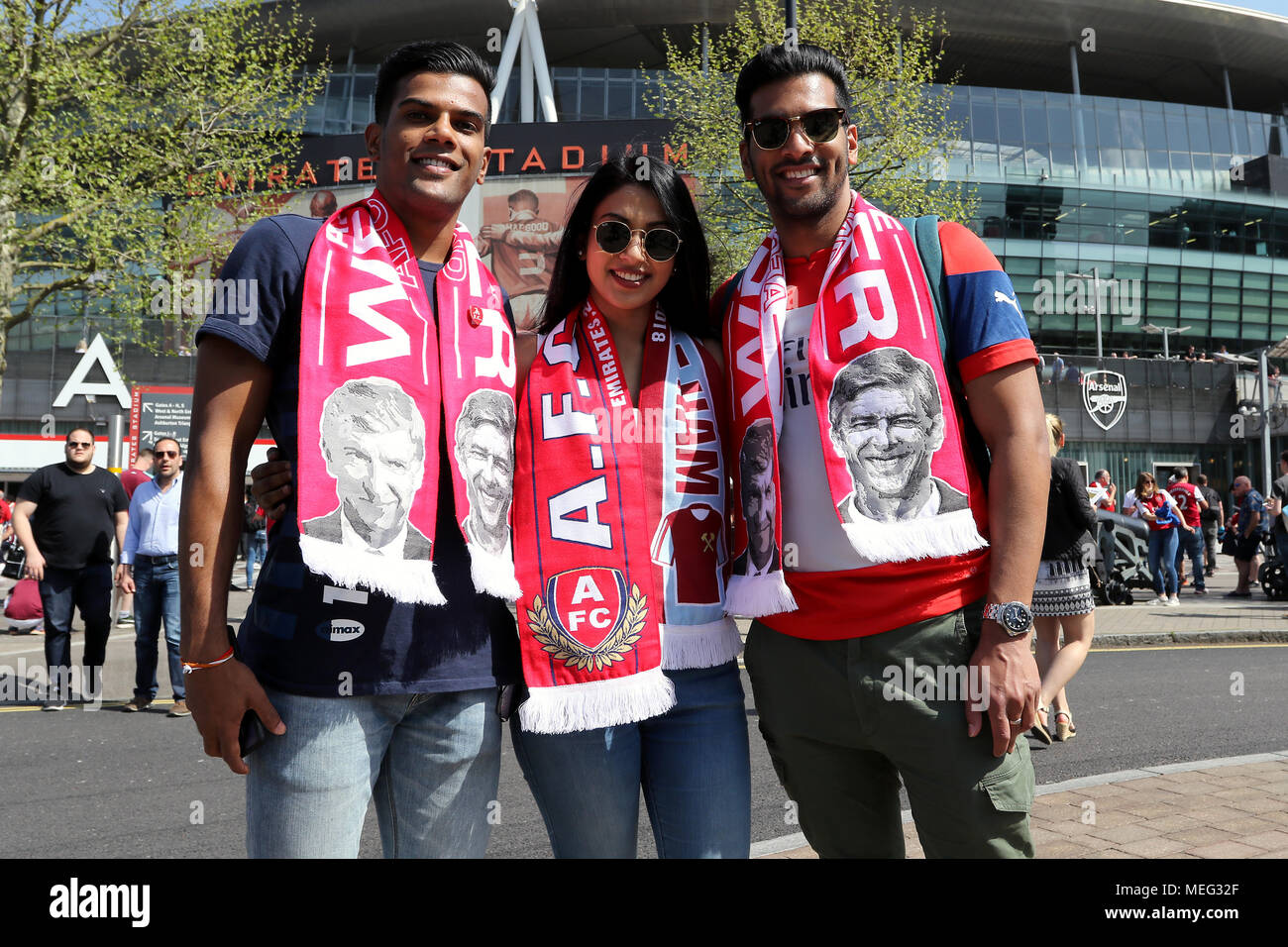 Arsenal fans pose for a picture prior to the Premier League match at ...