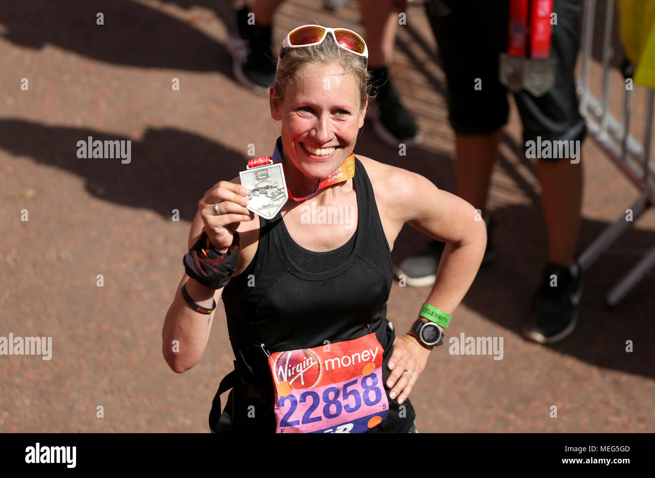 TV presenter Sophie Rayworth poses with her medal after completing the ...