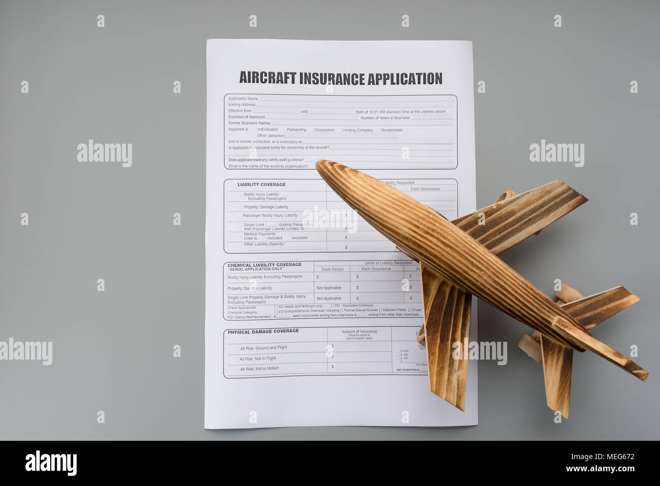 aircraft insurance application and an airplane model concept of travel ...