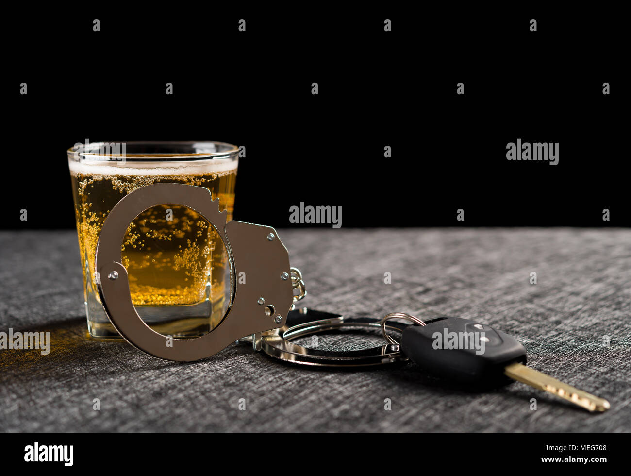 Handcuffs alcohol hi-res stock photography and images - Alamy
