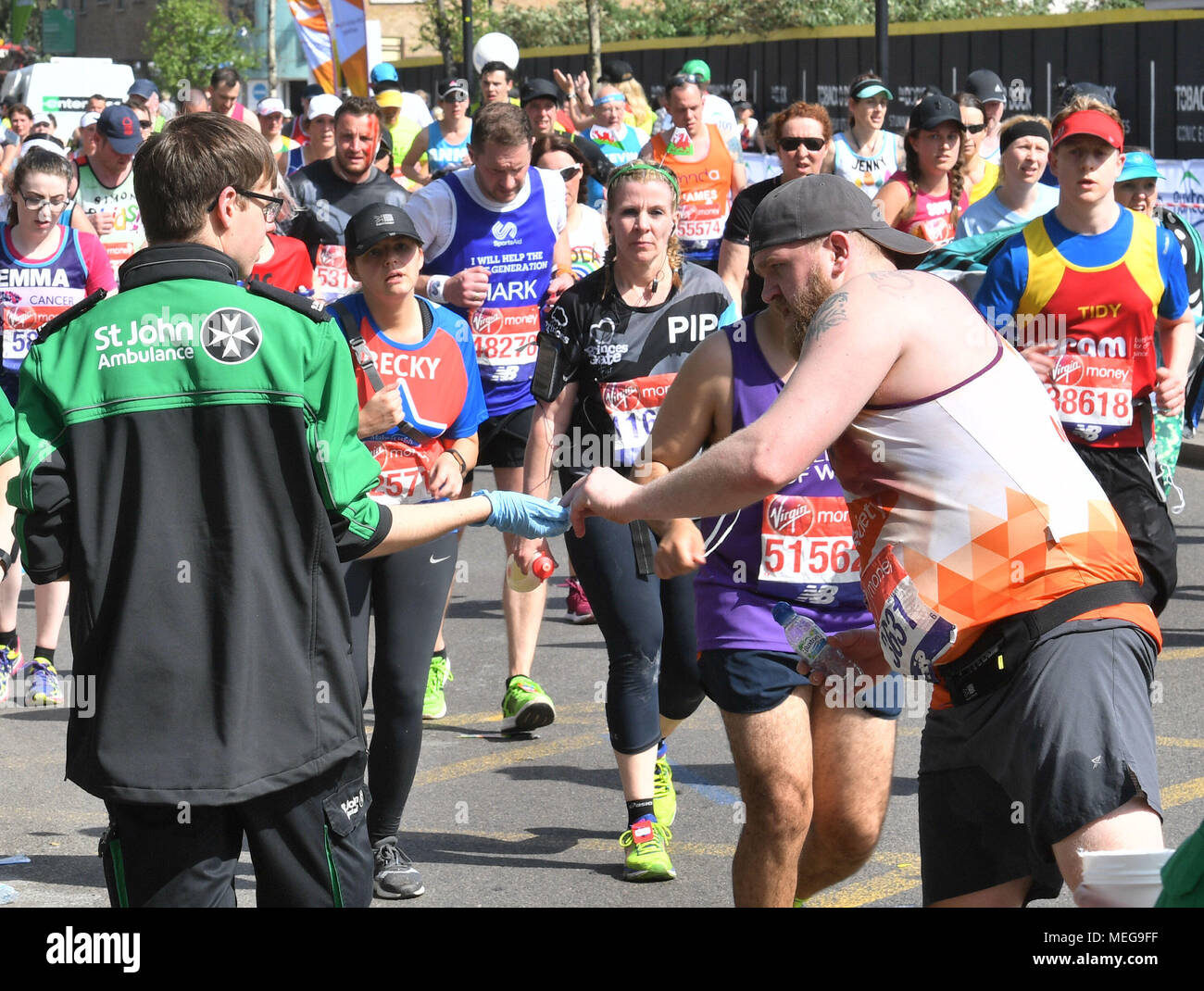 A first aider during the 2018 Virgin Money London Marathon Stock Photo ...