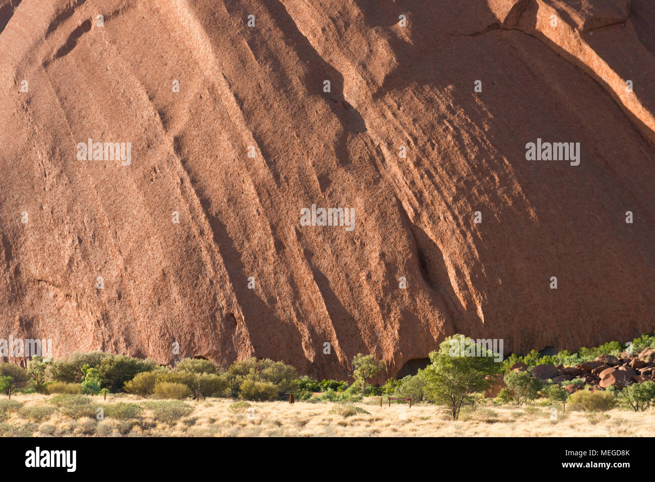 Sloping sedimentary layers visible in the rock face of Uluru (Ayers ...