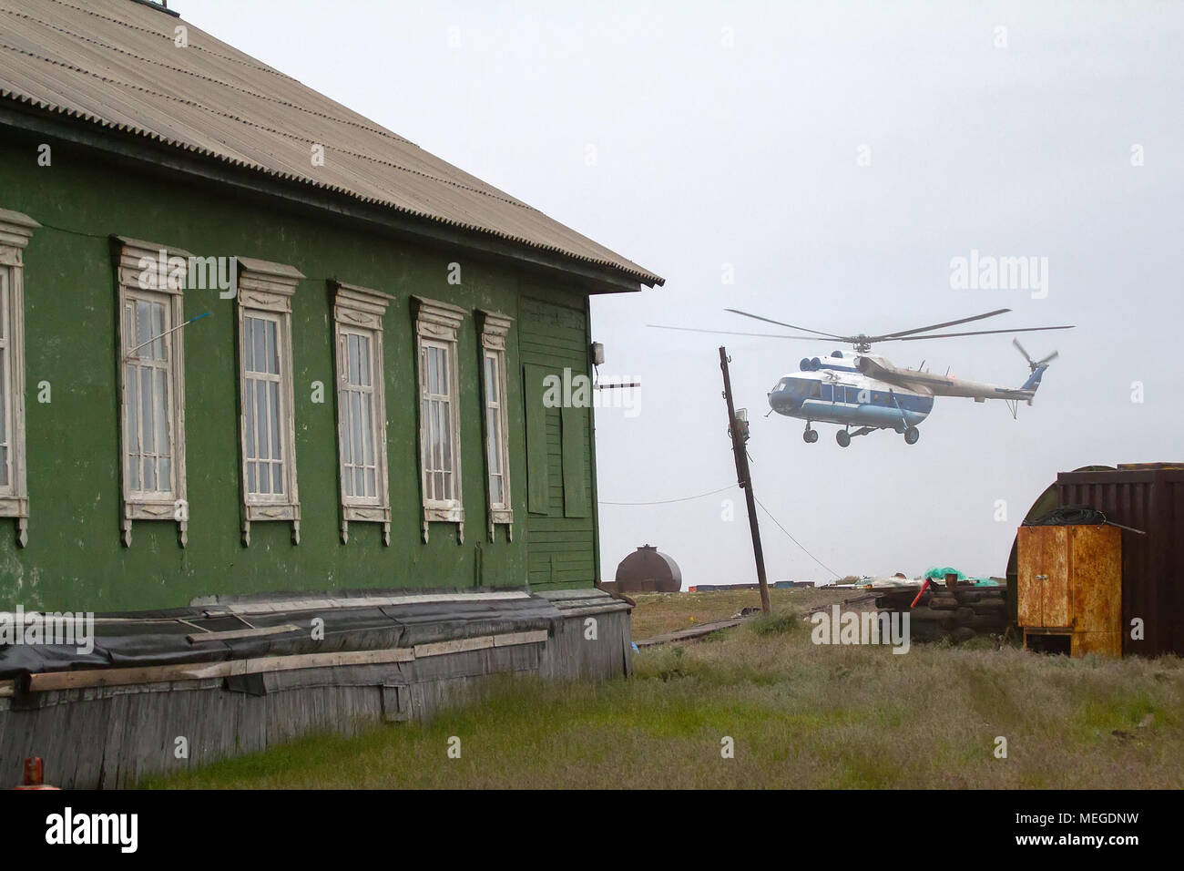 helicopter Mi-8 lands at polar station of Vaygach island, Kara Strait ...