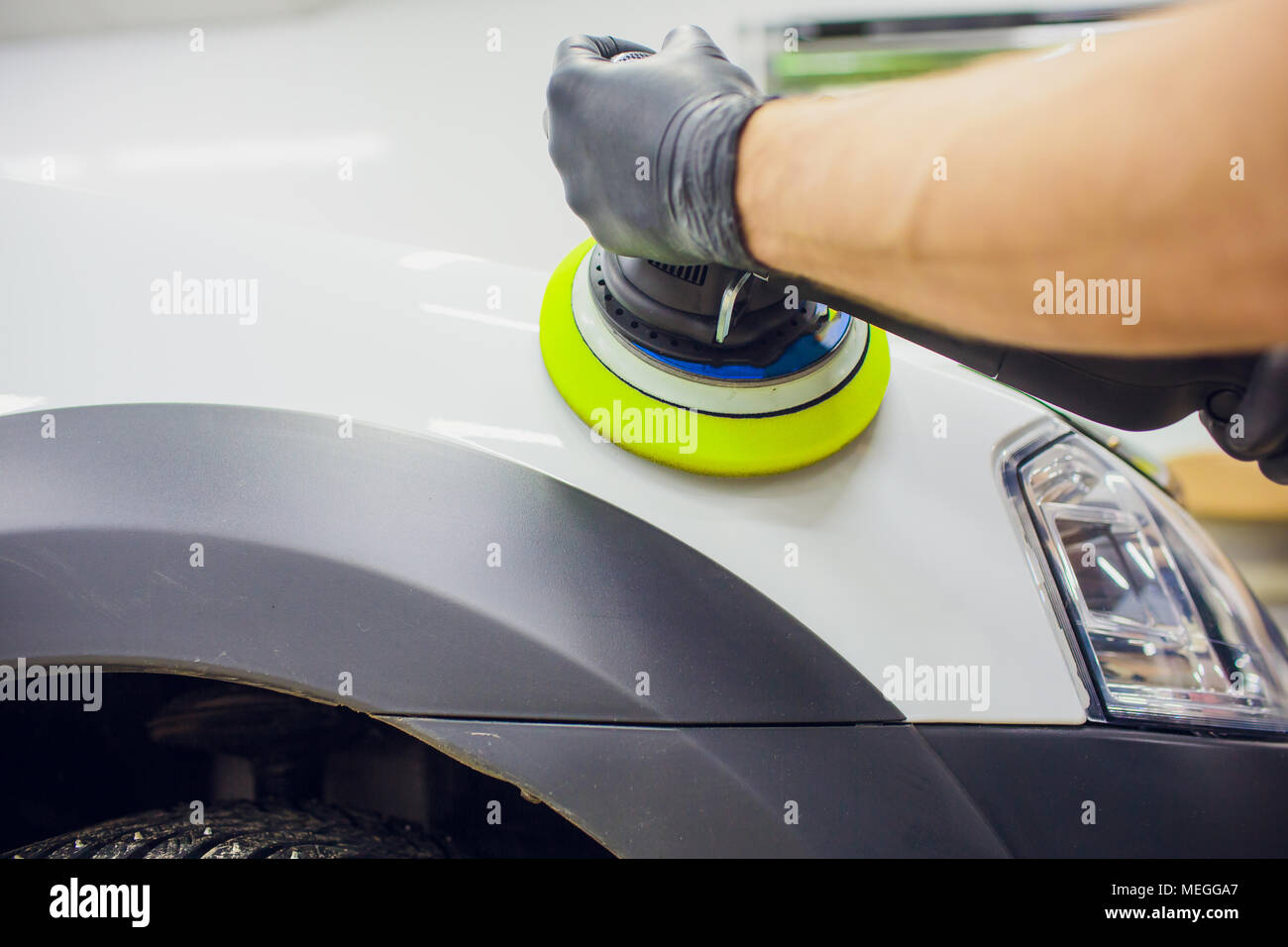 Car detailing Hands with orbital polisher in auto repair shop Stock ...