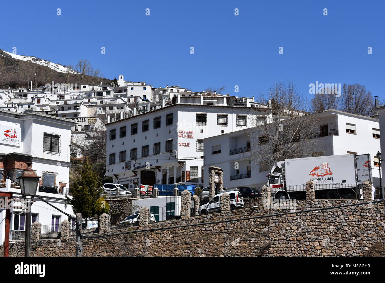 The white mountain village of Trevelez, famous for its air cured ham ...