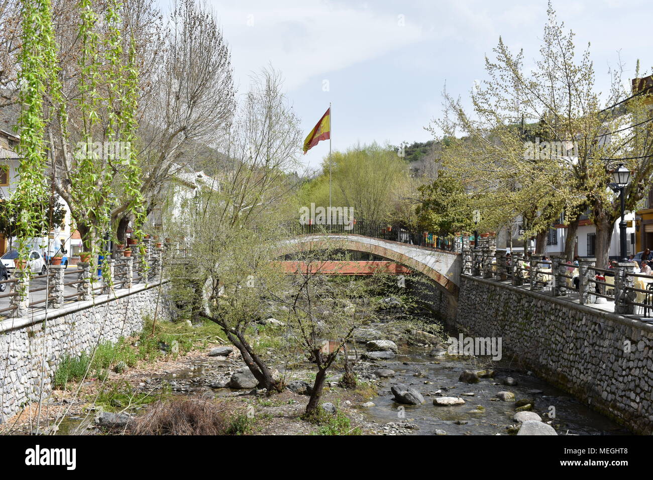Bridge crossing the river Genil which runs through the village of Pinos ...