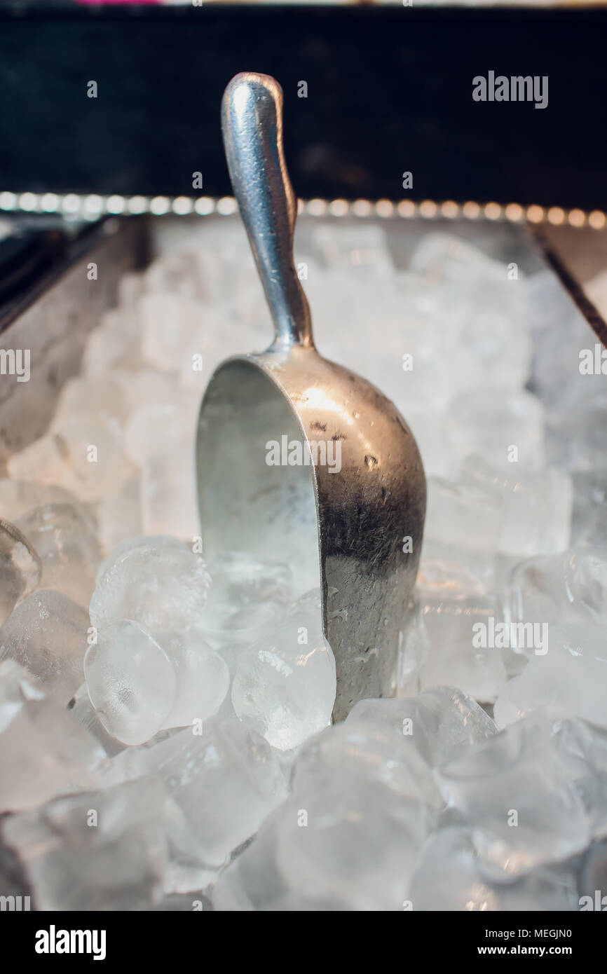 Ice scoop on the ice bar cold Stock Photo - Alamy