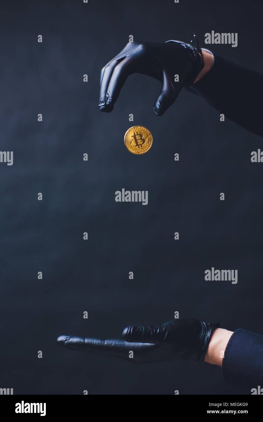 Male hands holding bitcoin thumb hi-res stock photography and images ...