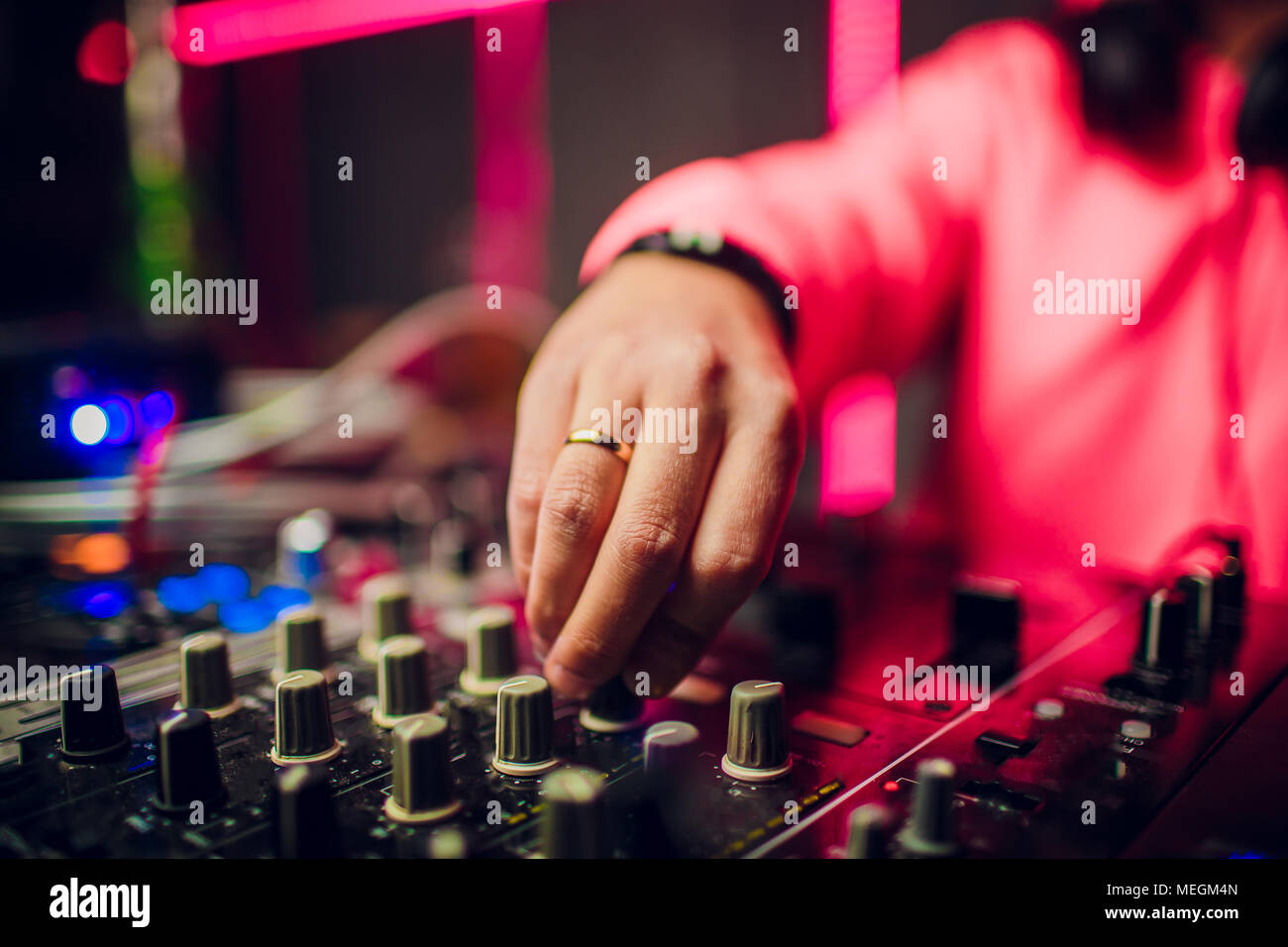 Dj mixing hand in nightclub at party Stock Photo - Alamy