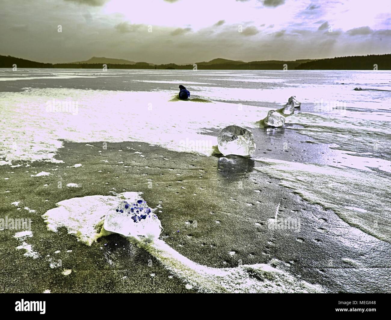 Shining broken ice. Abstract still life of ice floes. Wind, temperature ...
