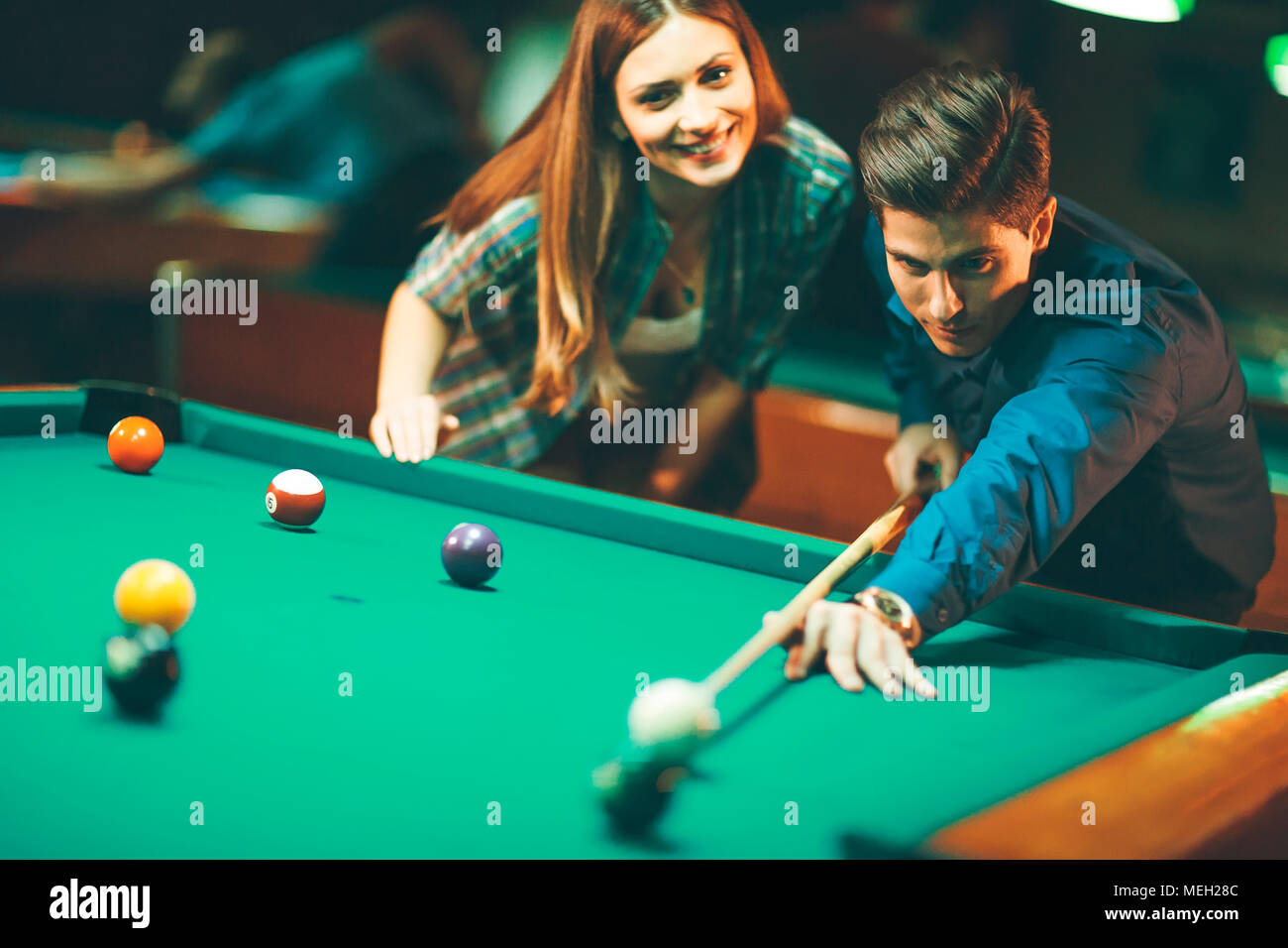 Playing pool in bar hi-res stock photography and images - Alamy