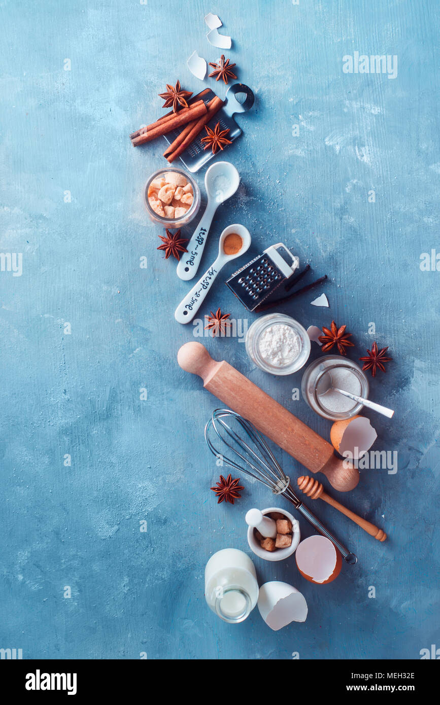 Baking ingredient flat lay with flour, sugar, cinnamon, milk, oil ...