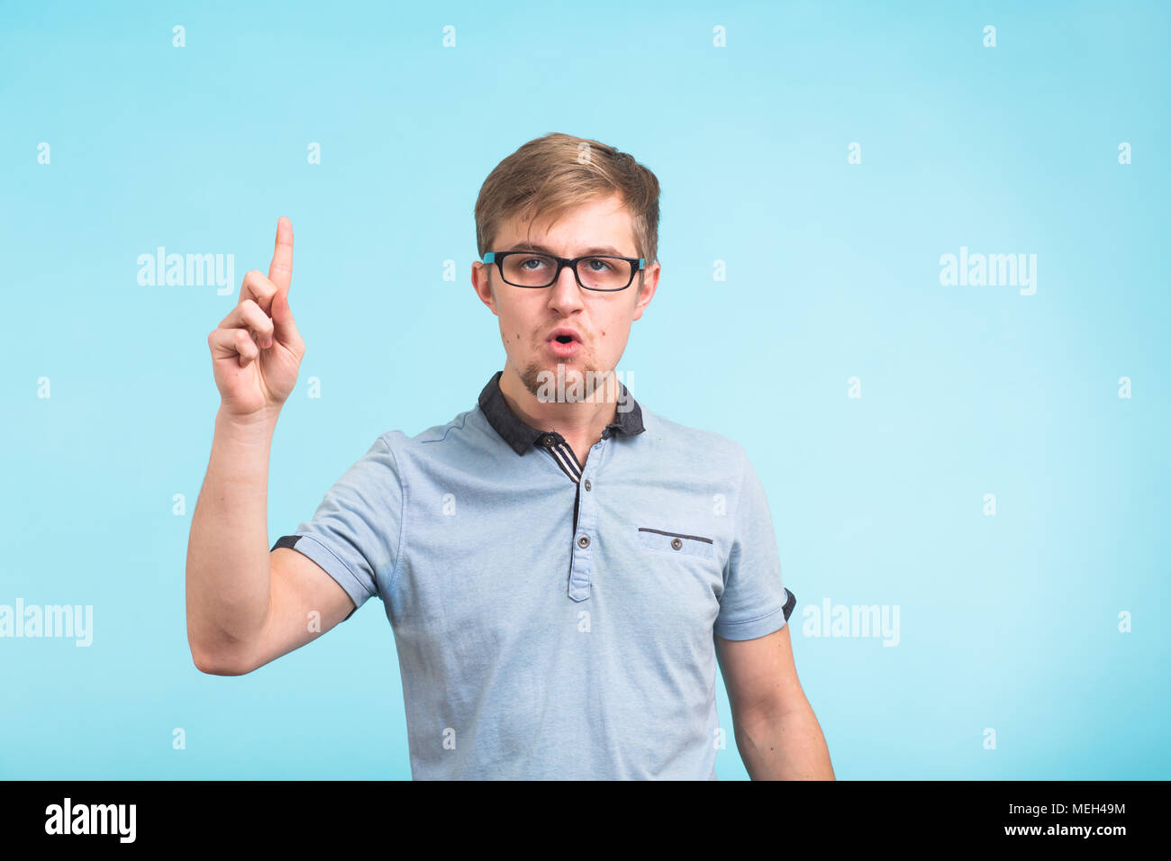 Wow, I understand it. Surprised young male raises finger as remembers ...