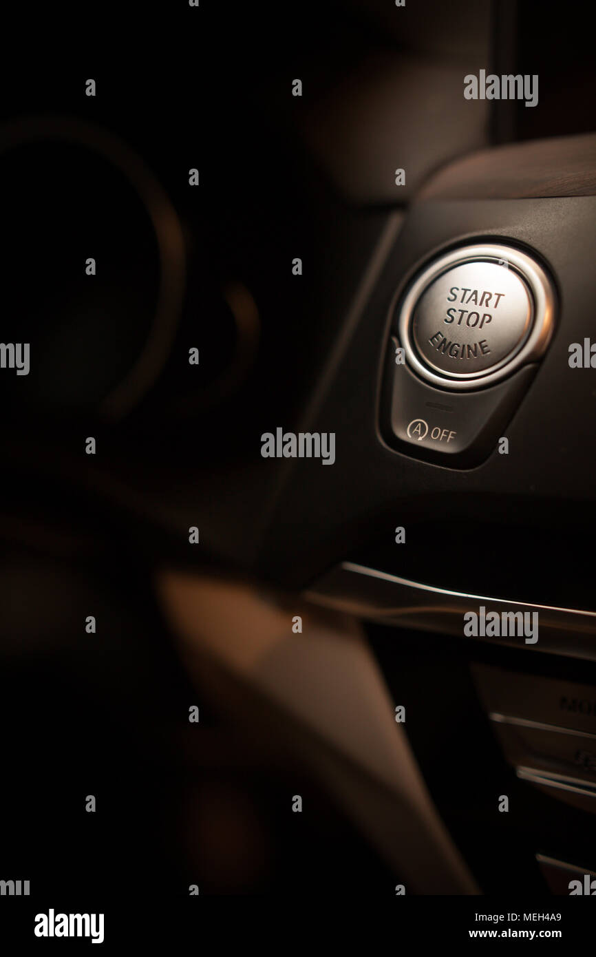 Close up shot of a car start/stop button Stock Photo - Alamy