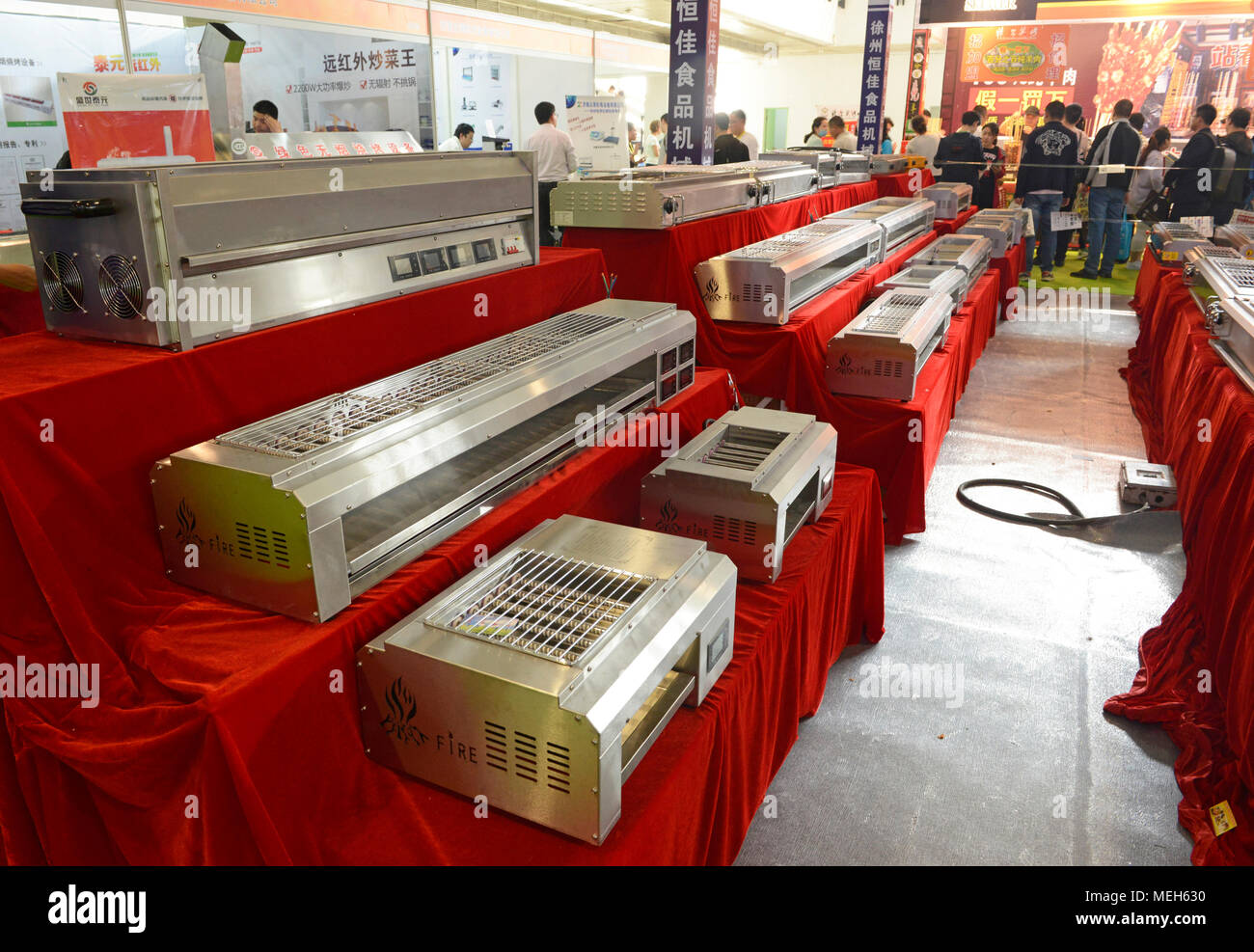 A range of barbecue grills are displayed at the China International ...