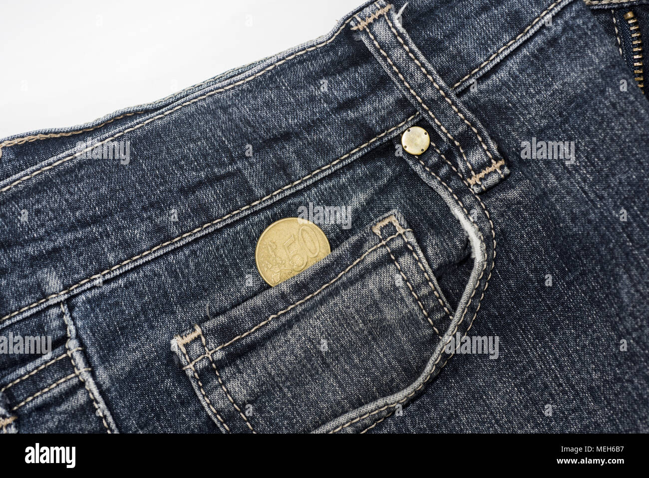 Euro banknotes in jeans. Abstract photo of money spending and money ...