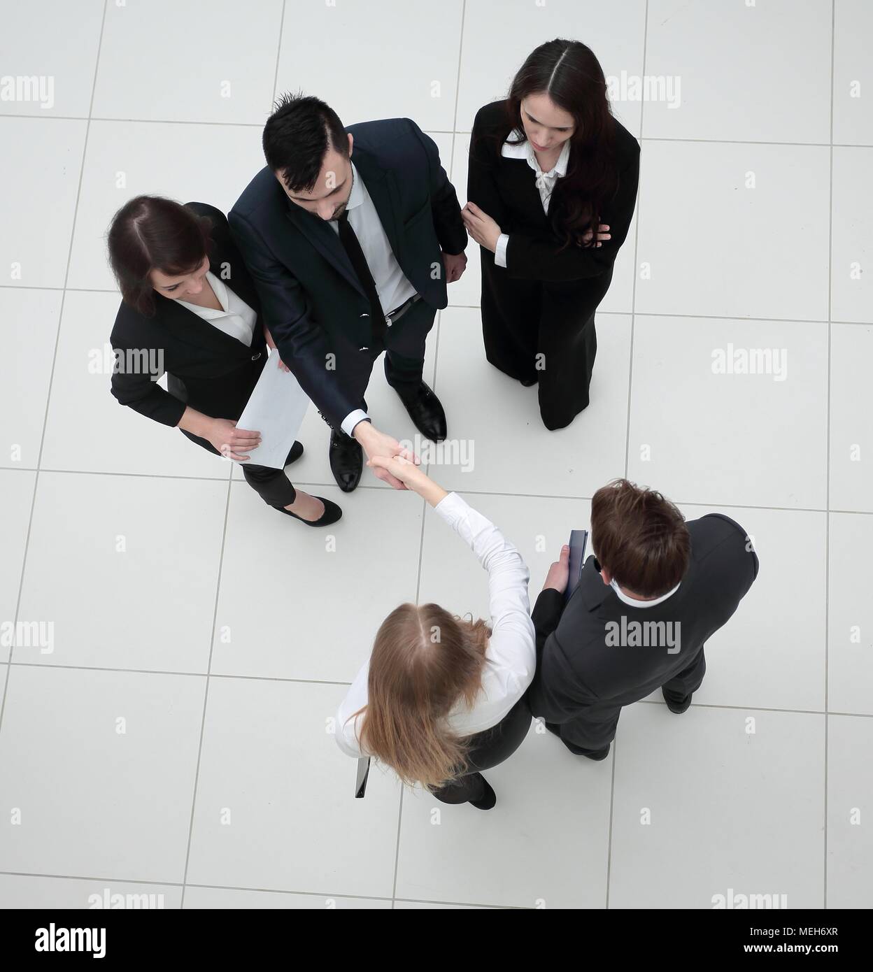 view from the top. handshake business partners Stock Photo - Alamy
