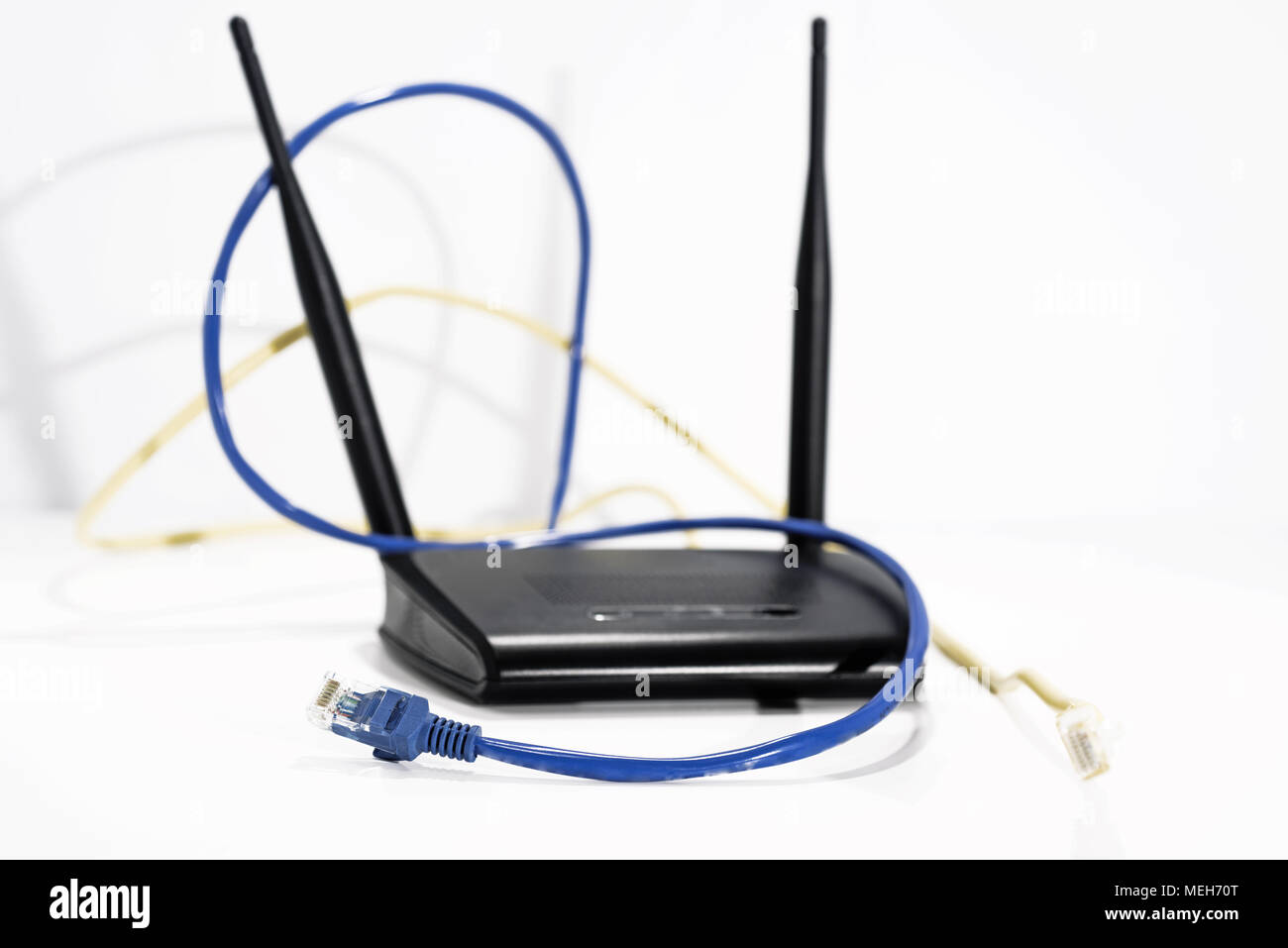 Black internet router. Isolated on white background Stock Photo - Alamy