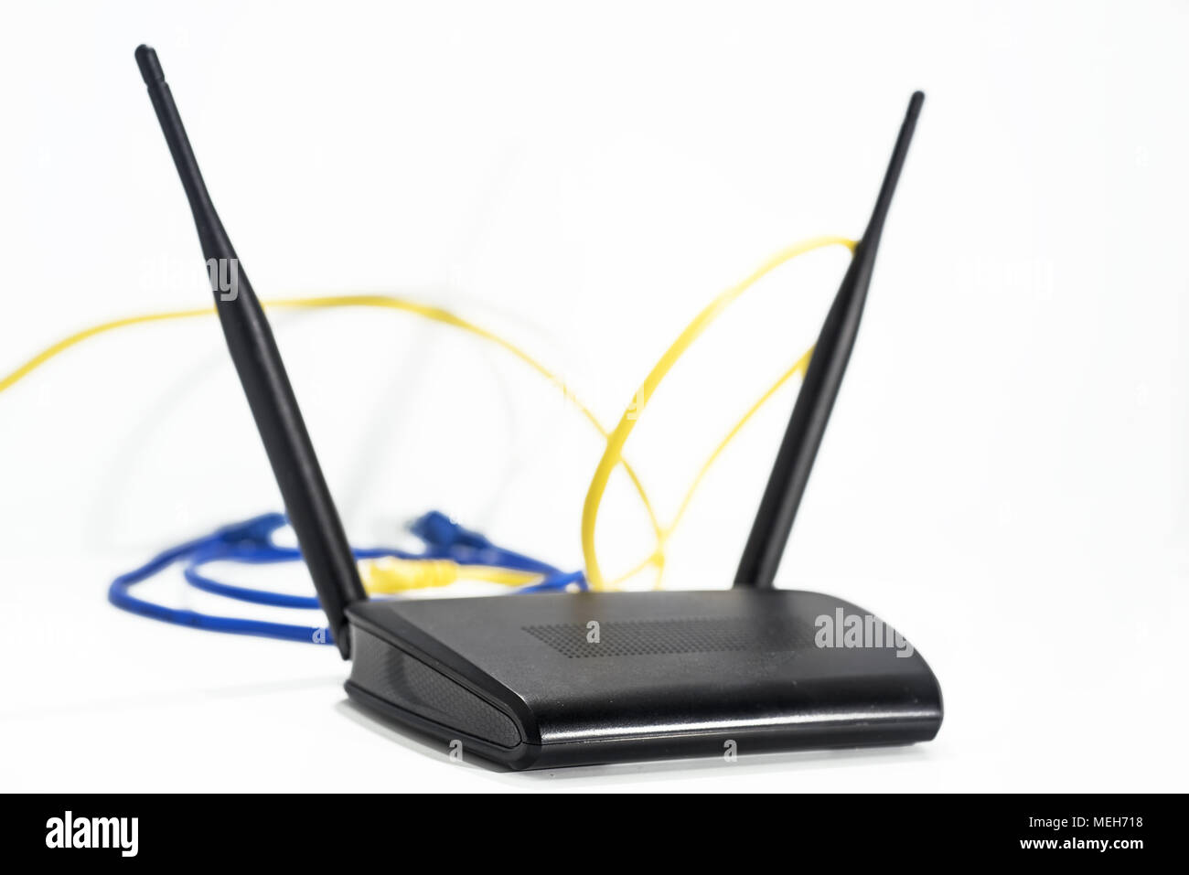 Black internet router. Isolated on white background Stock Photo - Alamy
