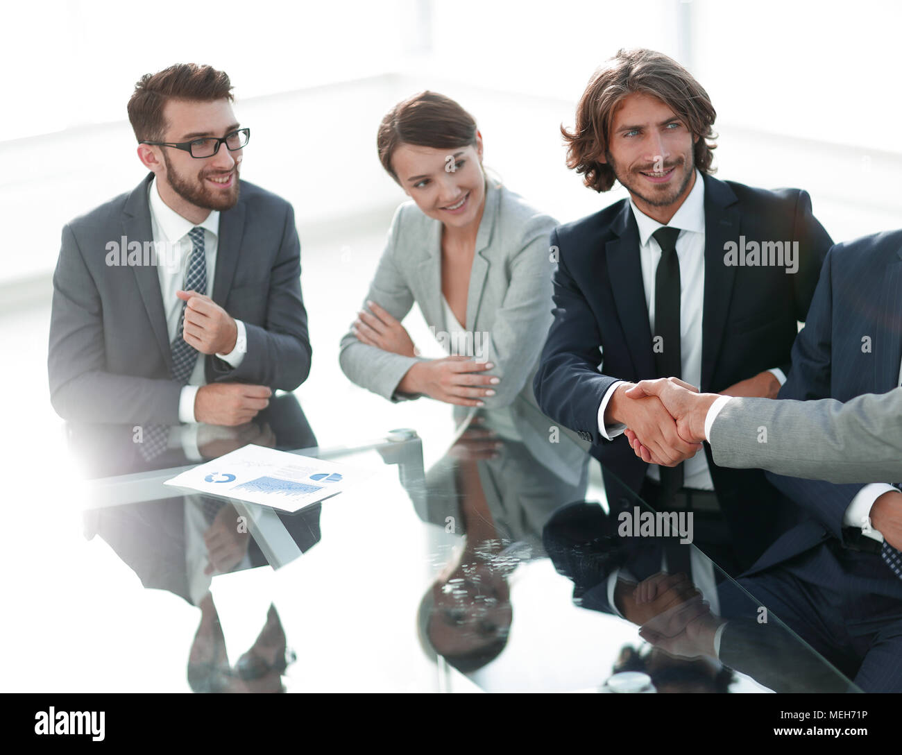 handshake partners at a business meeting Stock Photo - Alamy