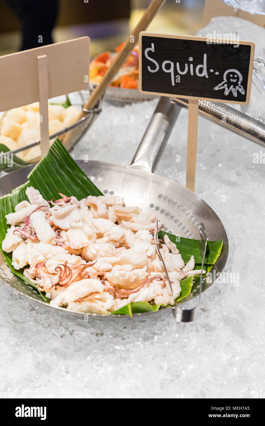 Squid cuttlefish seafood on ice Stock Photo - Alamy