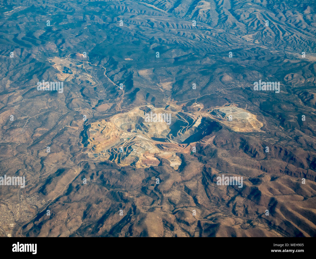 Aerial View of Two Large Holes On Mountains Formation Stock Photo - Alamy