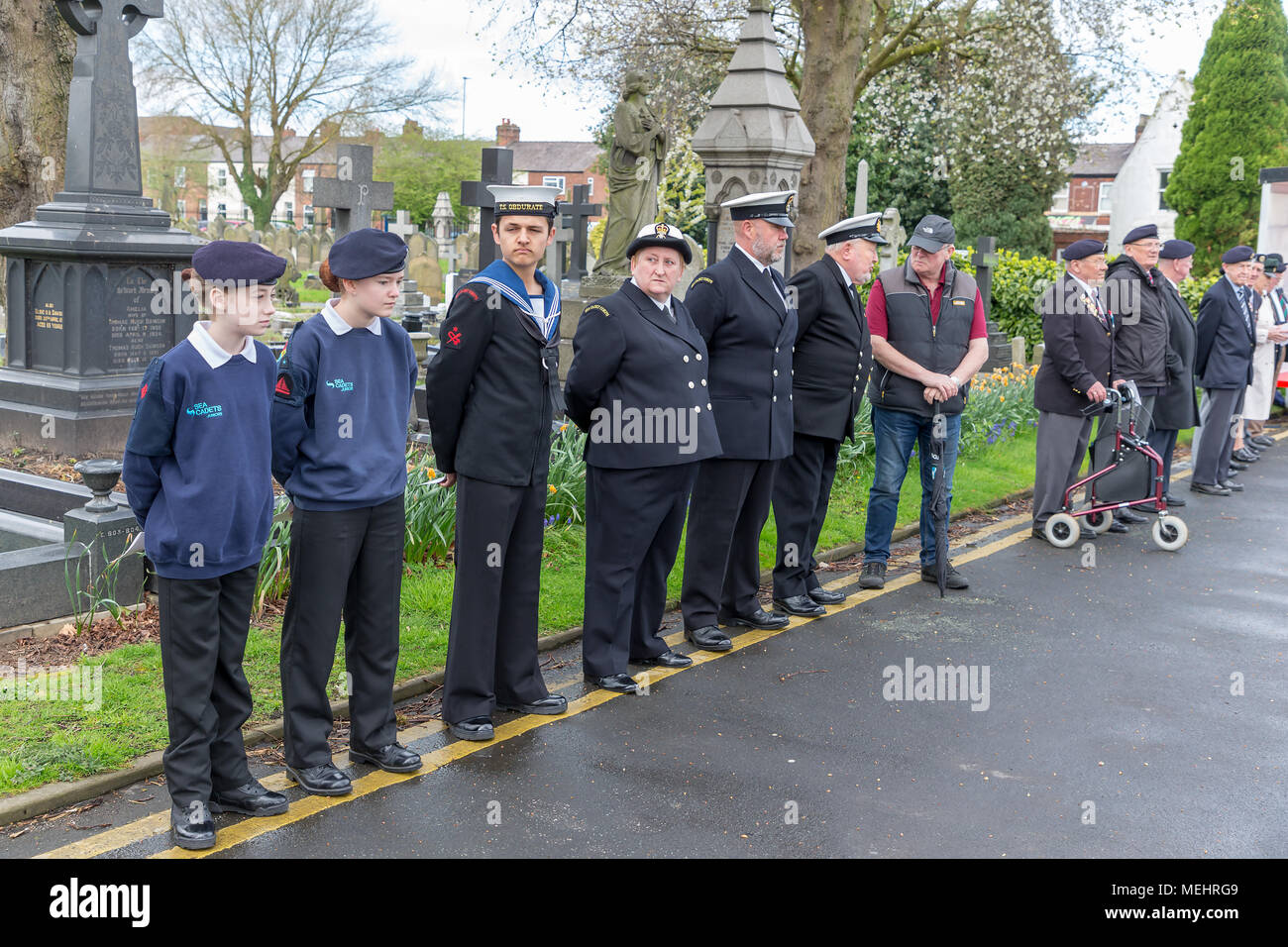 Children and Officers from Warrington Sea Cadets stand in line with ex ...