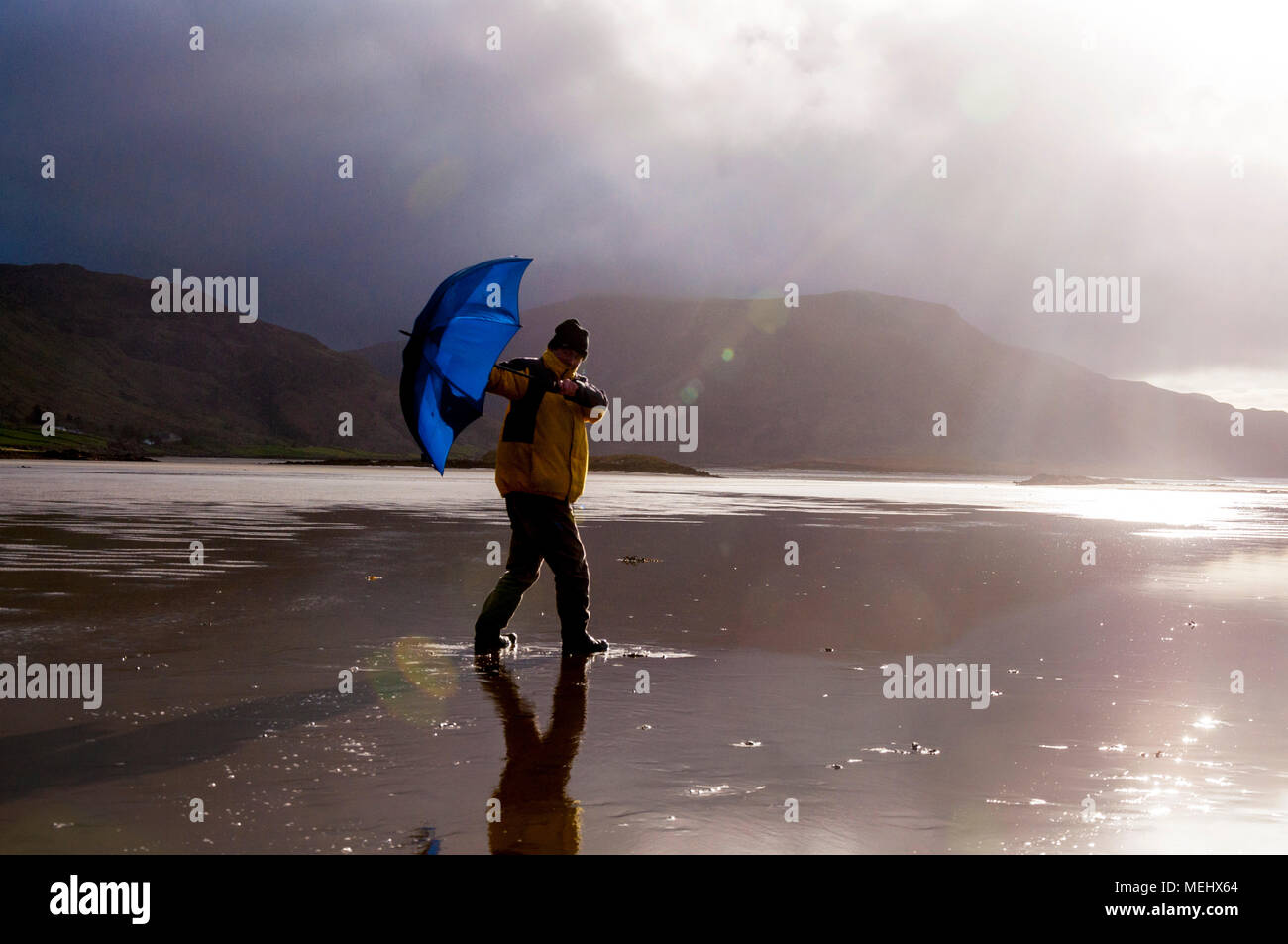 Windy weather man walking hi-res stock photography and images - Alamy