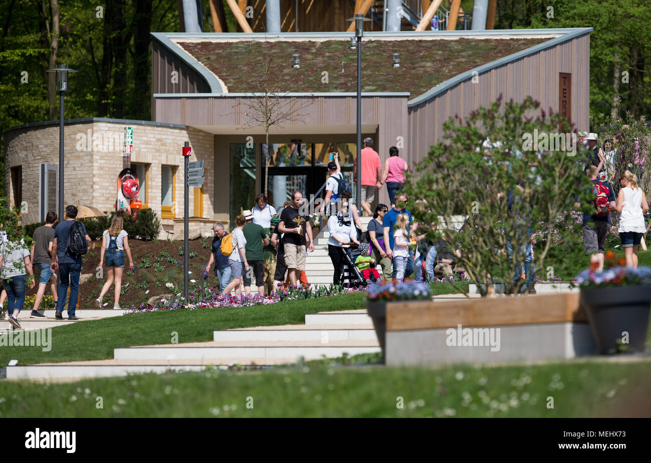 22 April 2018, Germany, Bad Iburg: Visitors walking on the grounds of ...