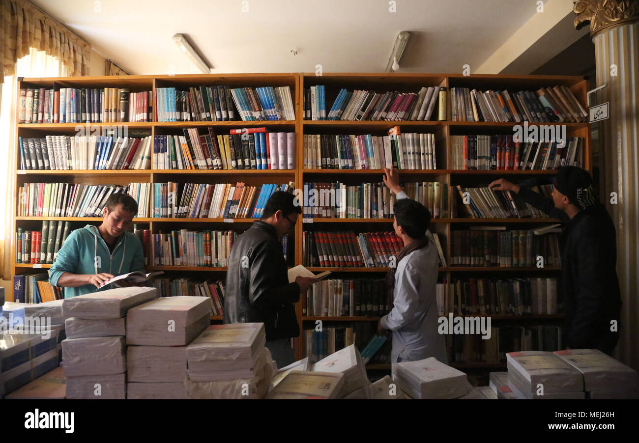 Mazar I Sharif. 23rd Apr, 2018. Students read books at a library in ...