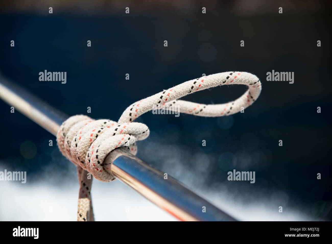 Rope on a handrail of a ship hi-res stock photography and images - Alamy