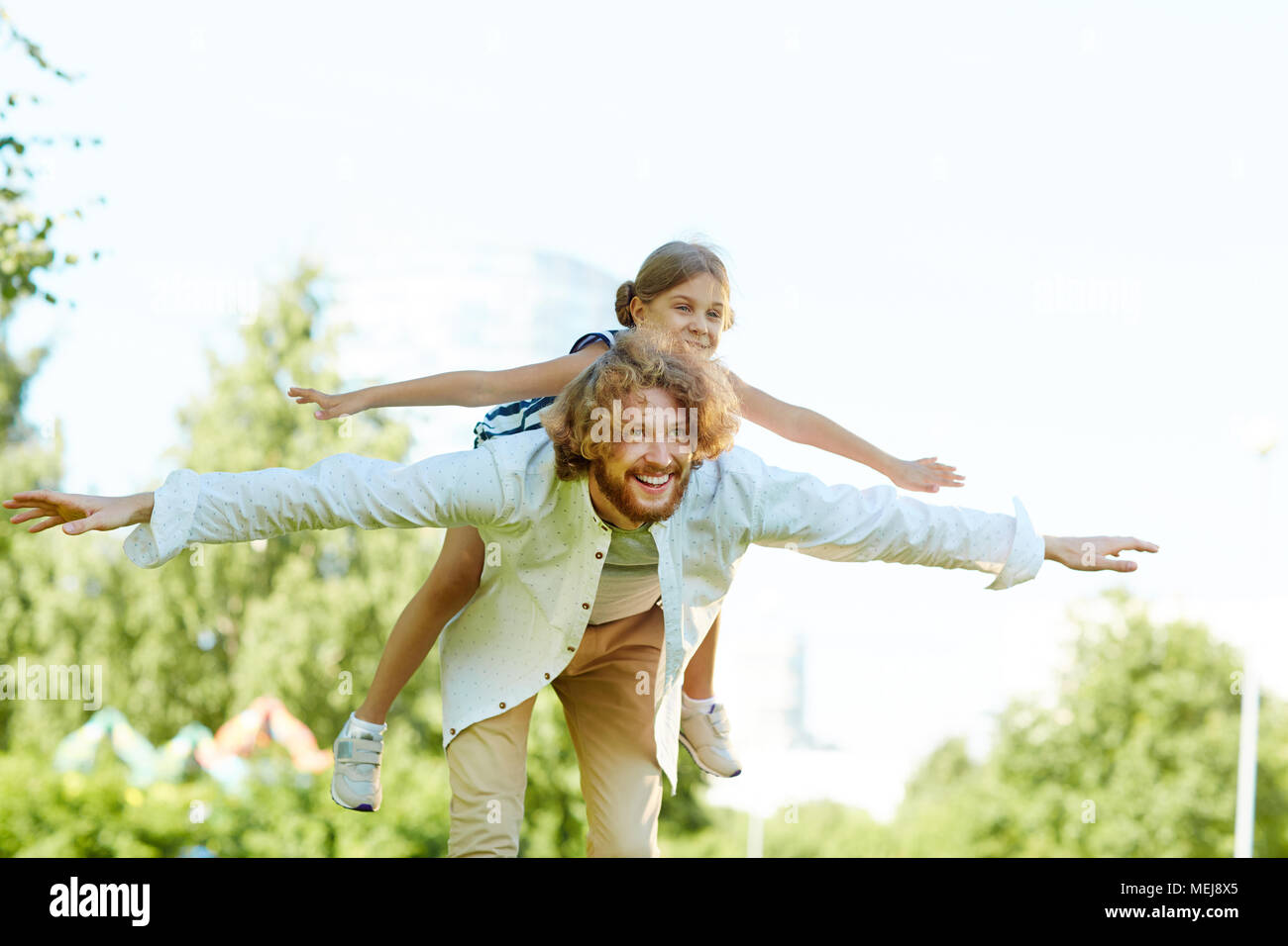 Piggyback and stretching Stock Photo - Alamy