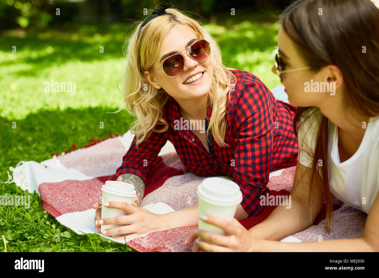Conversation of girls Stock Photo - Alamy