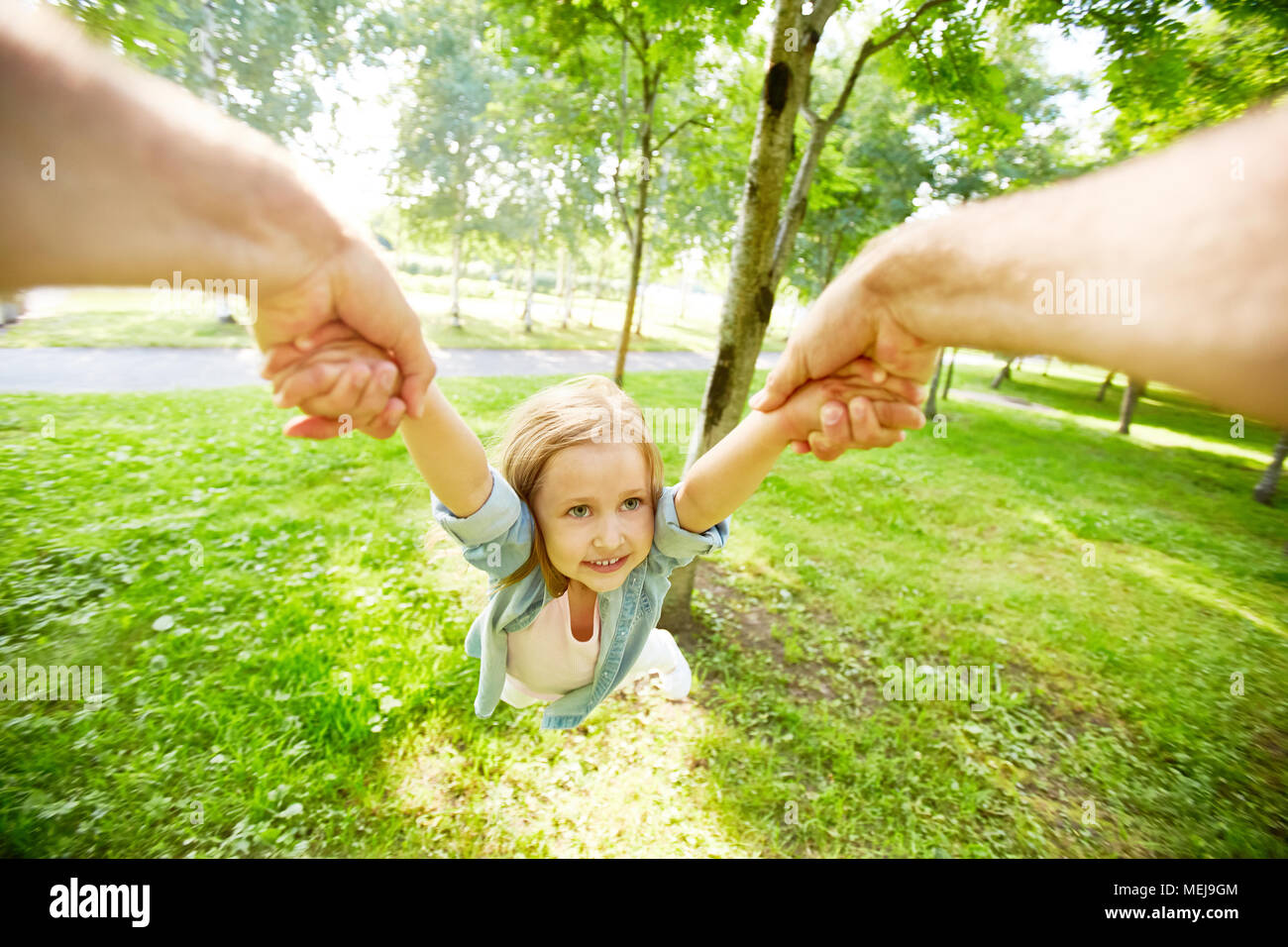 Child whirling hi-res stock photography and images - Alamy