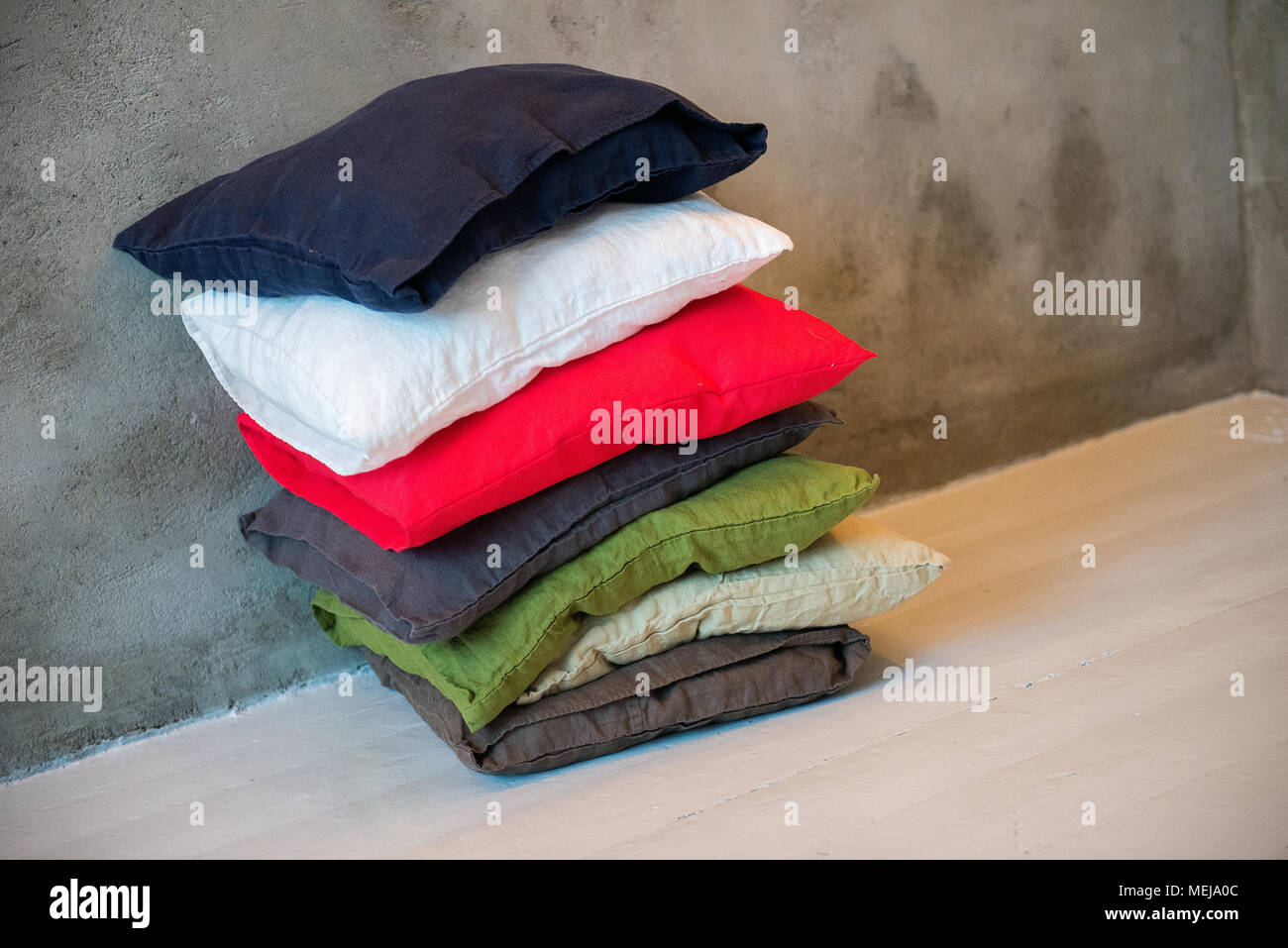 Colorful decorative pillows in modern interior Stock Photo - Alamy