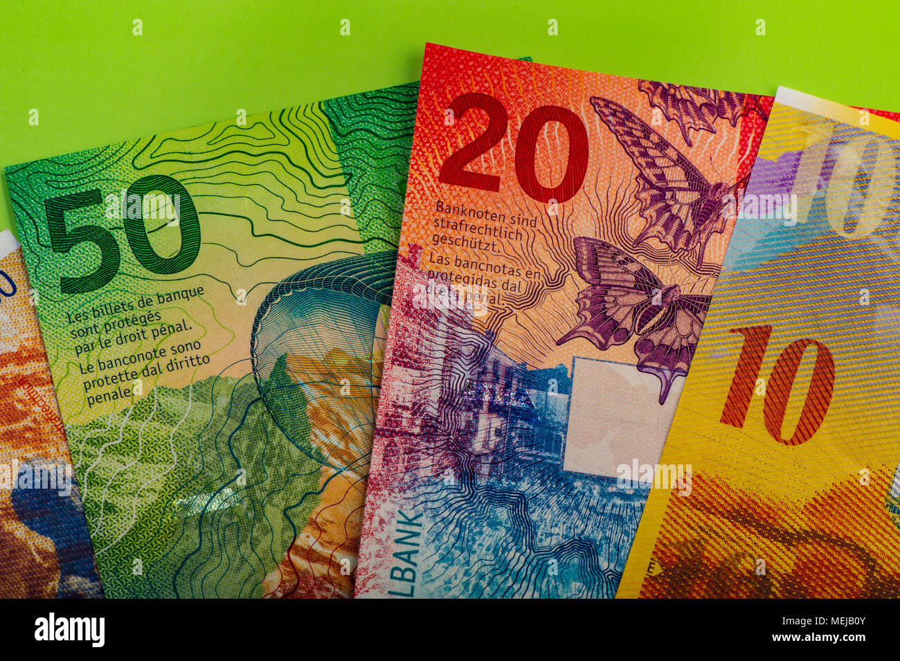 Swiss banknotes are fifty, ten, twenty francs and a notepad. Cash Stock ...