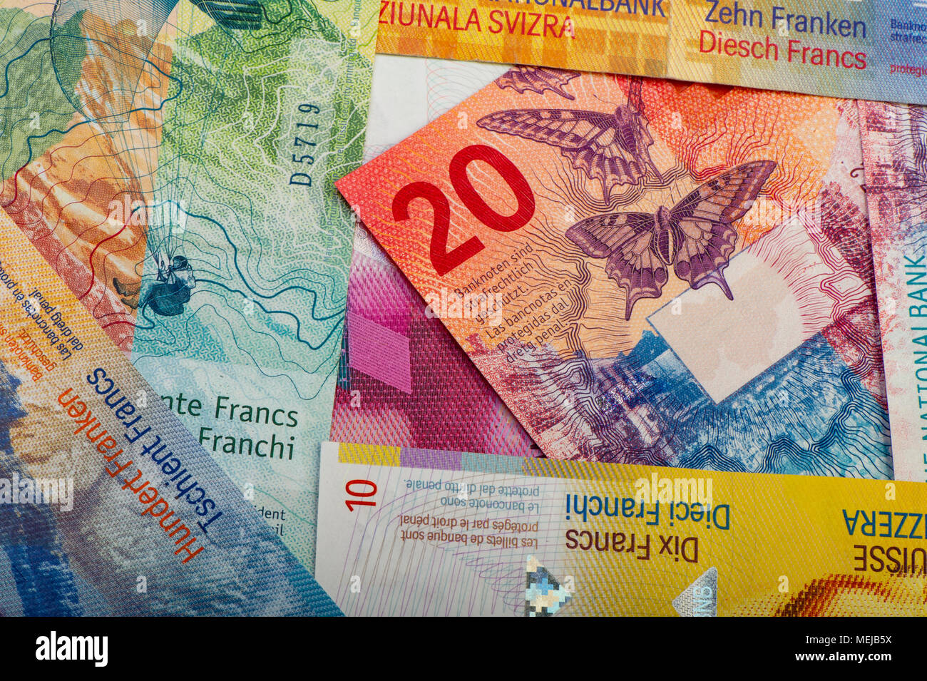 Swiss banknotes - a collection of old and new twenty franc notes. Cash ...