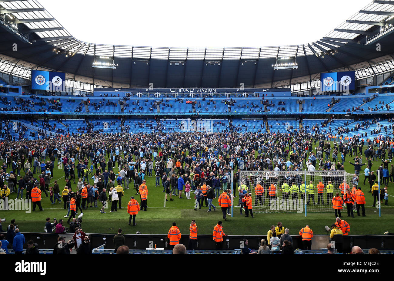Pitch invaders after the final whistle during the Premier League match ...
