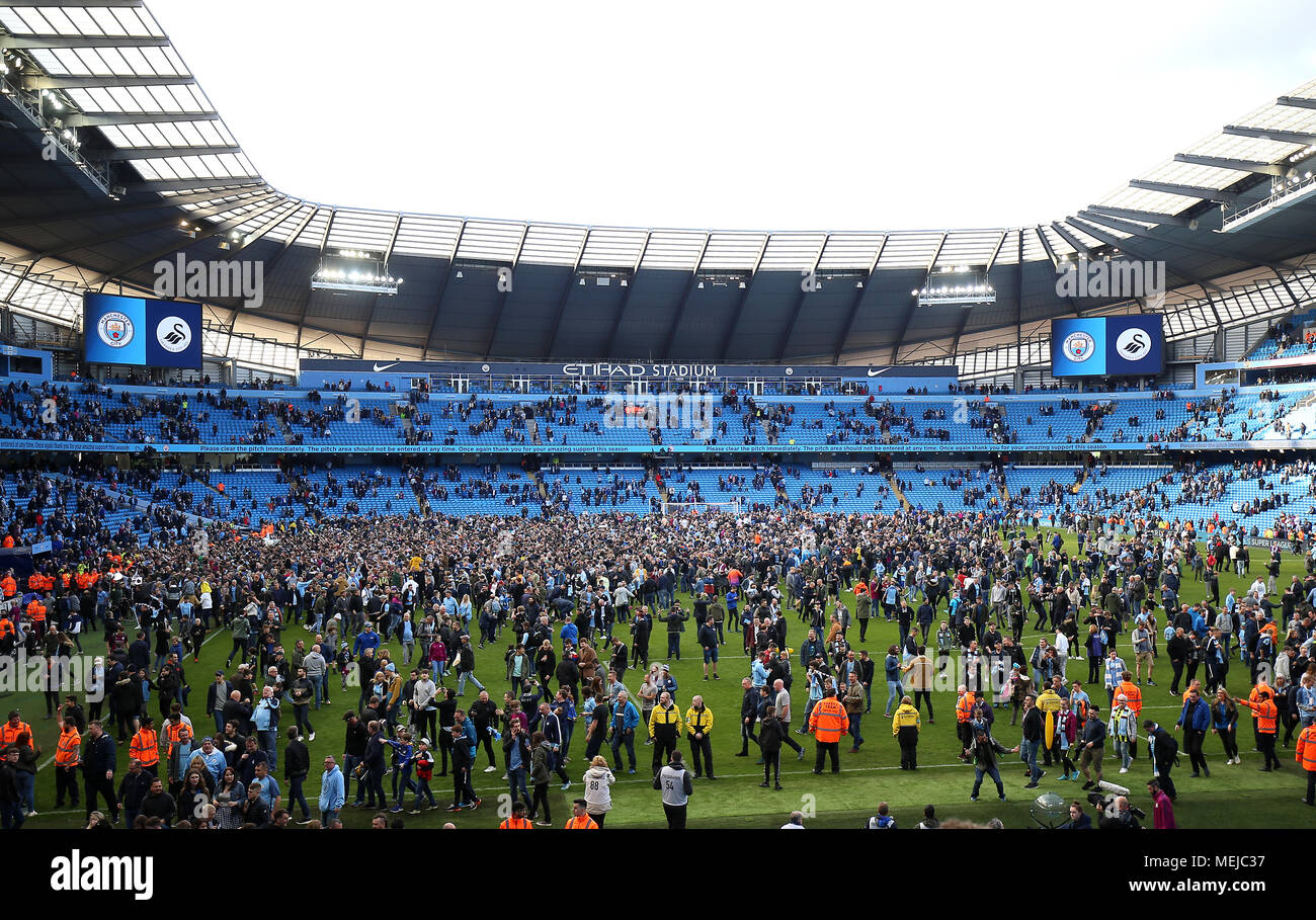Pitch invaders after the final whistle during the Premier League match ...